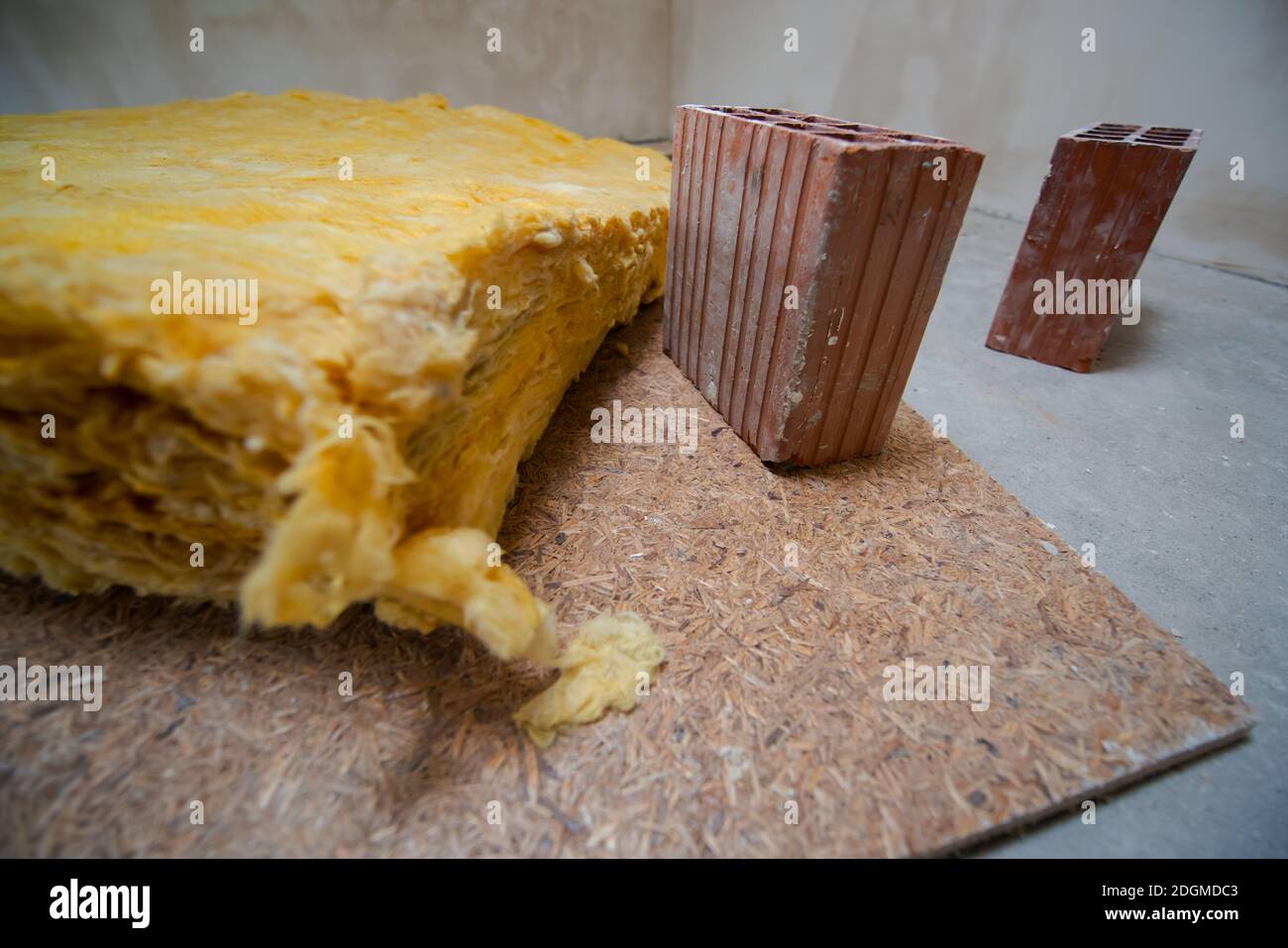 Red Bricks and glass wool Stock Photo - Alamy