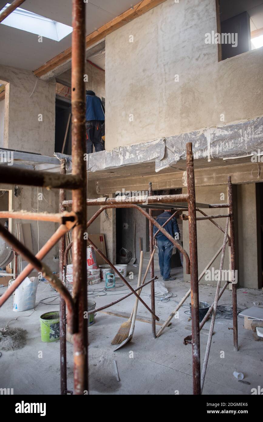 Interior of construction site with scaffolding Stock Photo - Alamy