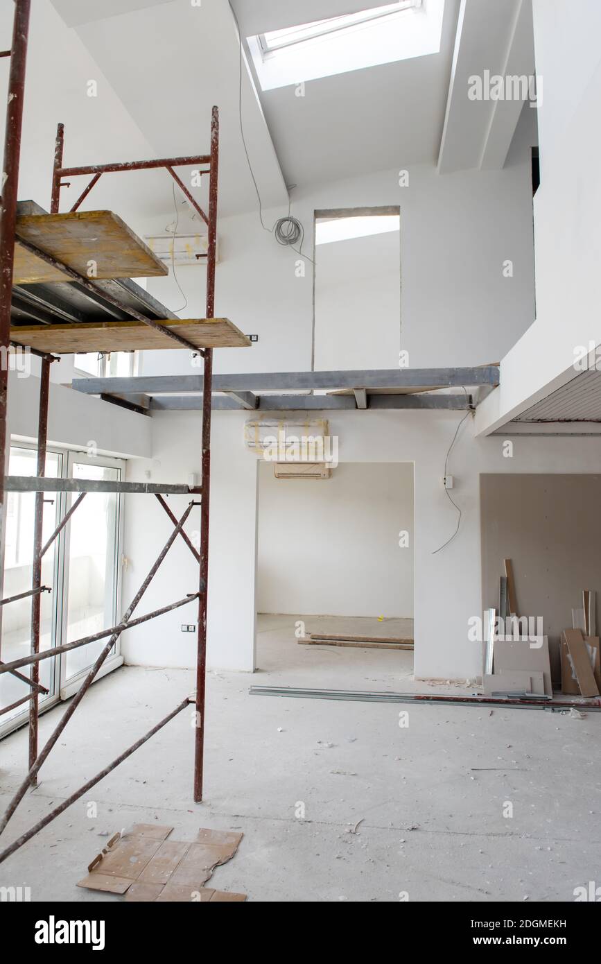 Interior of construction site with scaffolding Stock Photo - Alamy