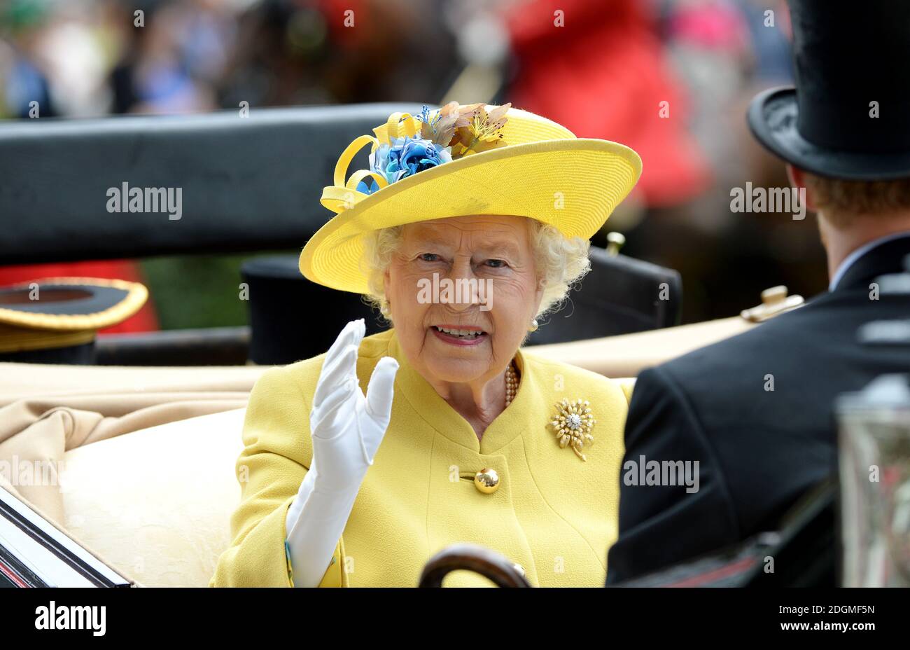 Queen Elizabeth II arrives by horse drawn carriage during day one of ...