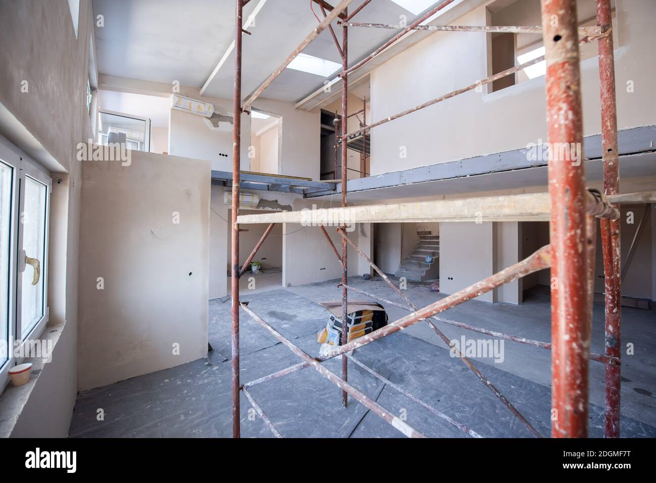 Interior of construction site with scaffolding Stock Photo - Alamy