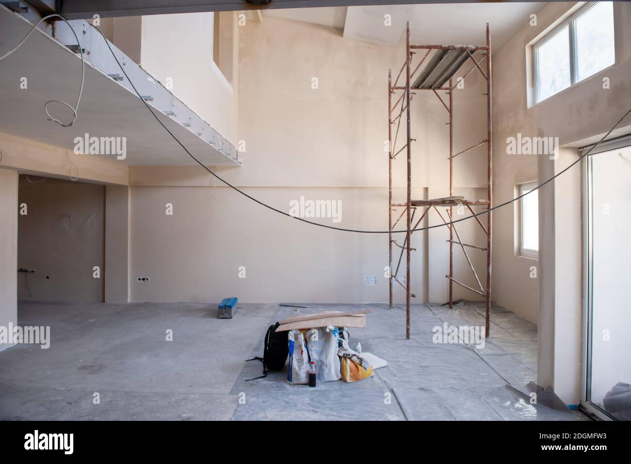 Interior of construction site with scaffolding Stock Photo - Alamy