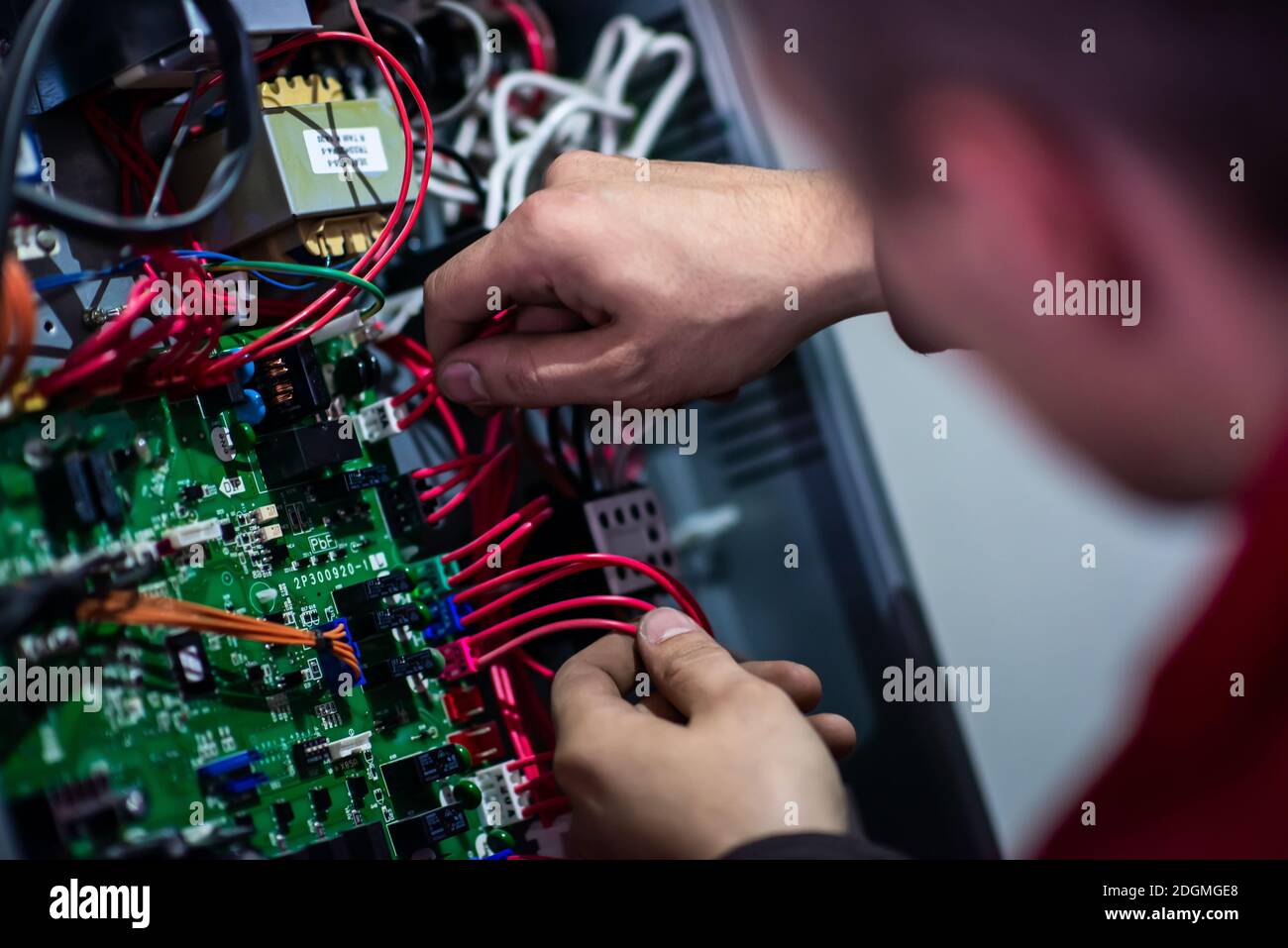 Electrician engineer working with electric cable wires Stock Photo - Alamy