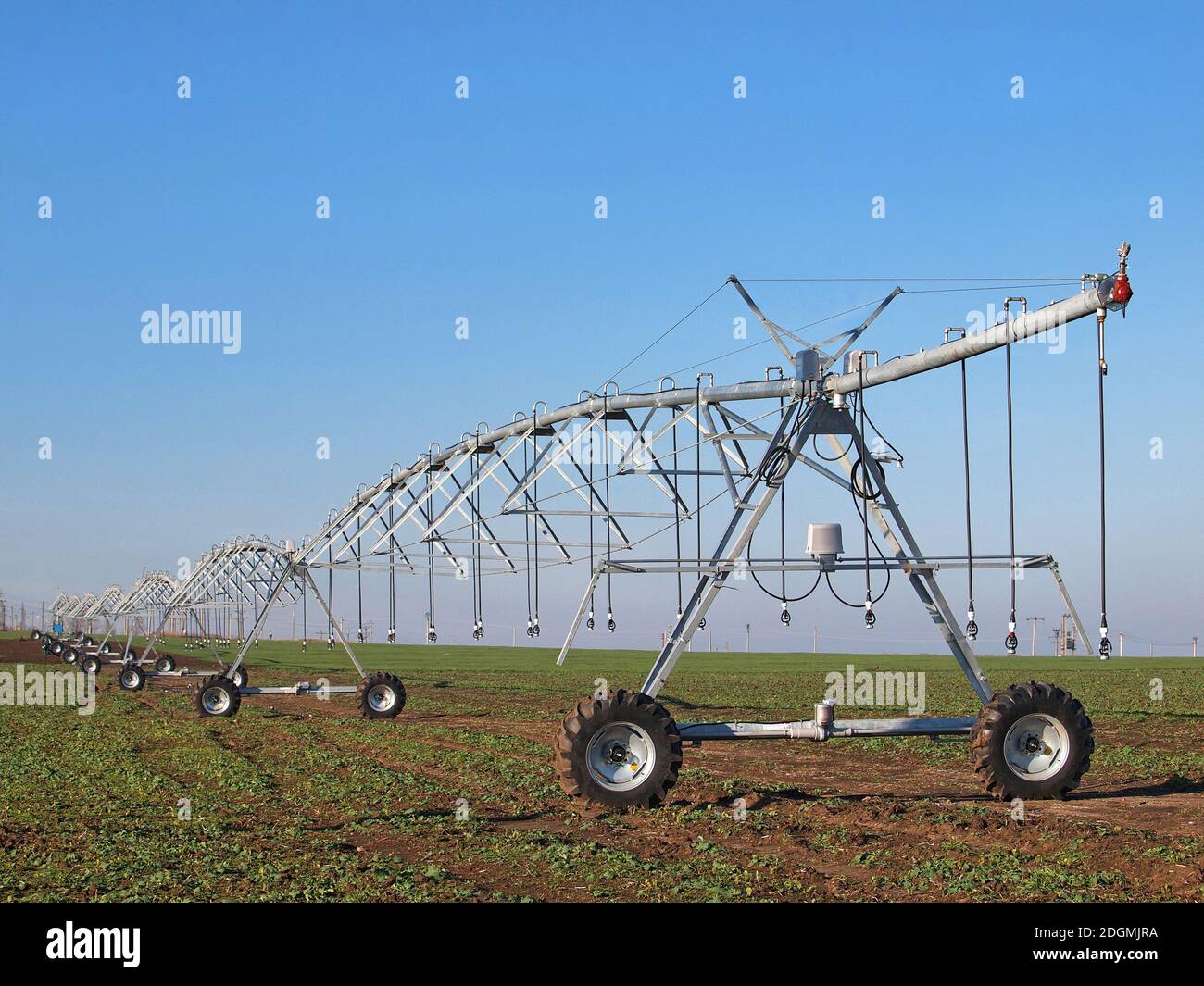 Irrigation system on wheels on the field Stock Photo - Alamy