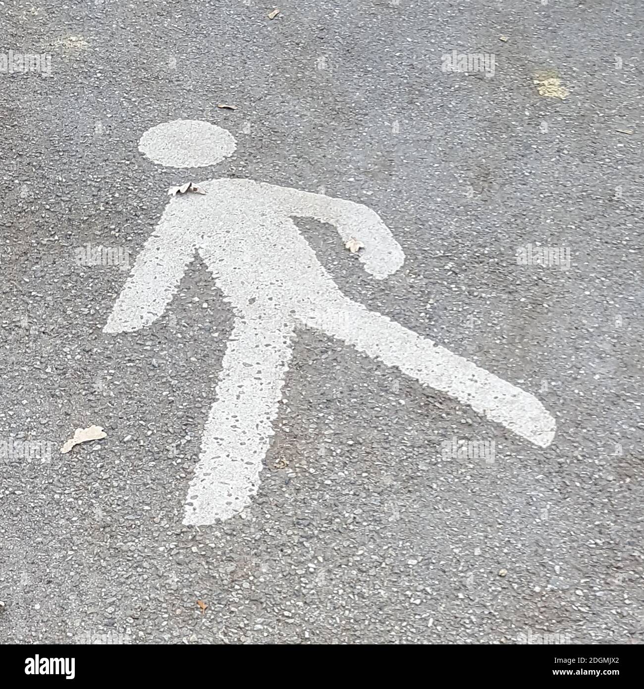 Symbol Pedestrian path on asphalt Stock Photo - Alamy