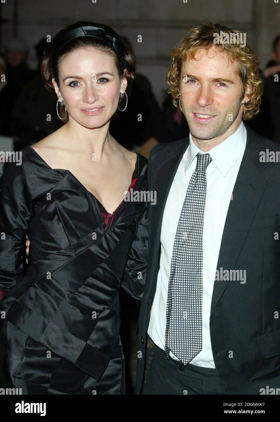 Emily Mortimer and husband arriving at the UK premiere of Match Point ...