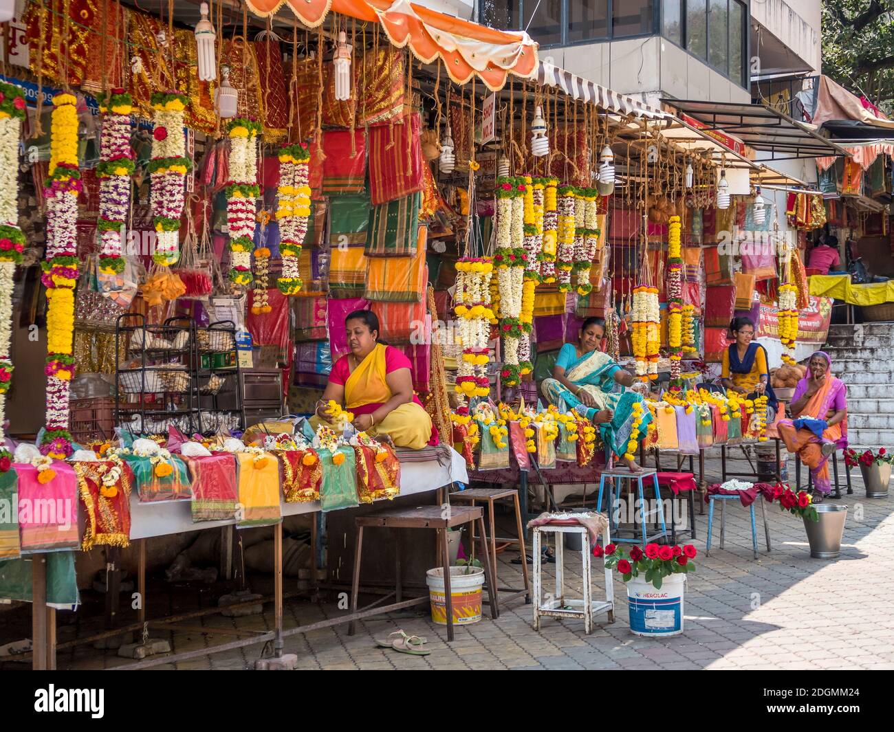 PUNE, INDIA - MARCH 14, 2019: Indian women in traditional dress sell ...