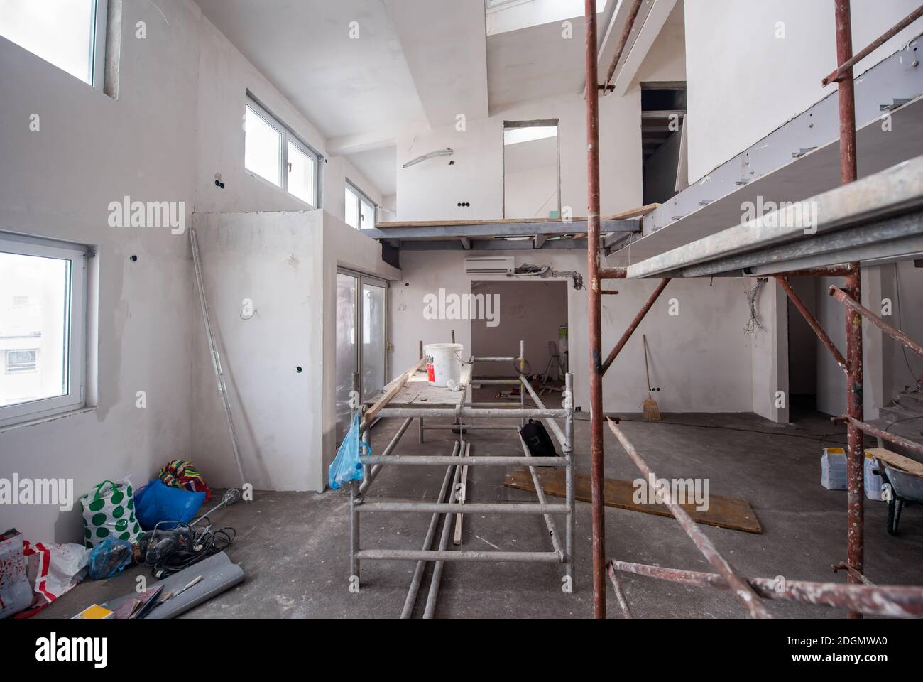 Interior of construction site with scaffolding Stock Photo - Alamy