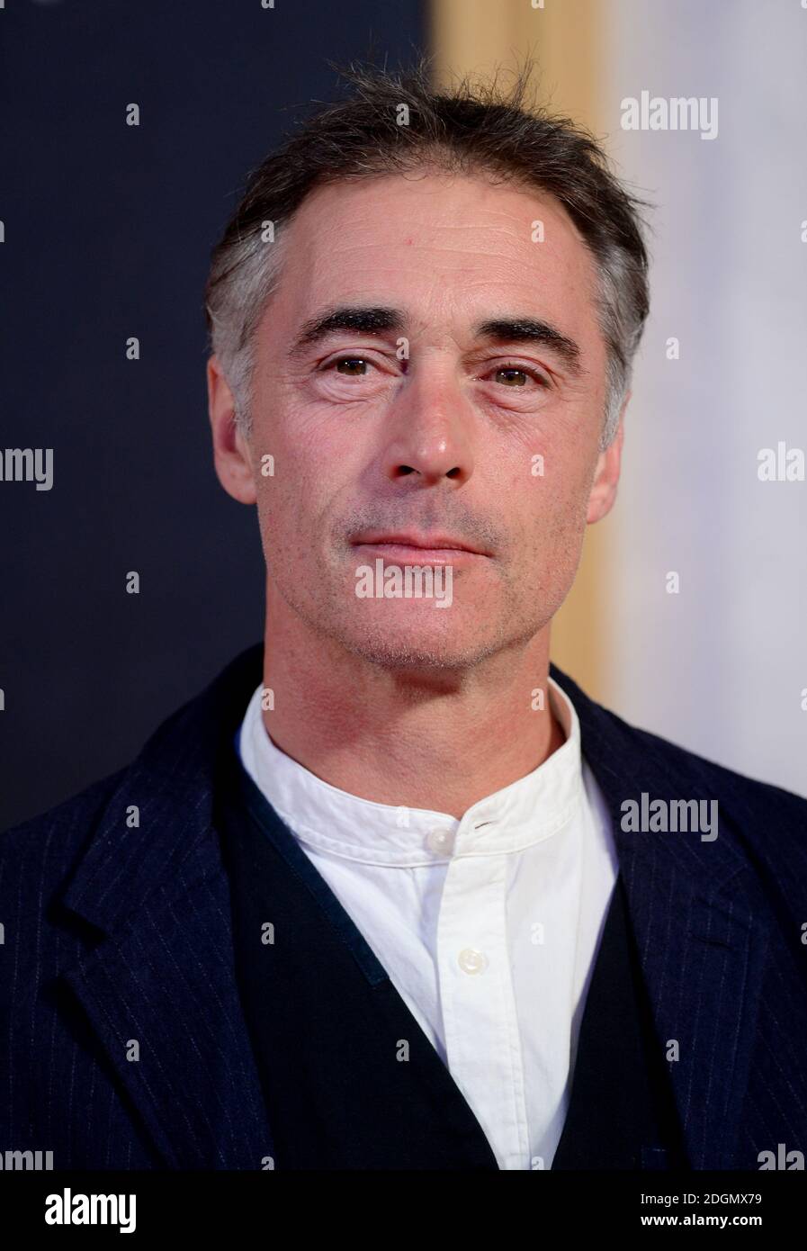 Greg Wise attending the premiere of The Crown at Odeon Leicester Square ...