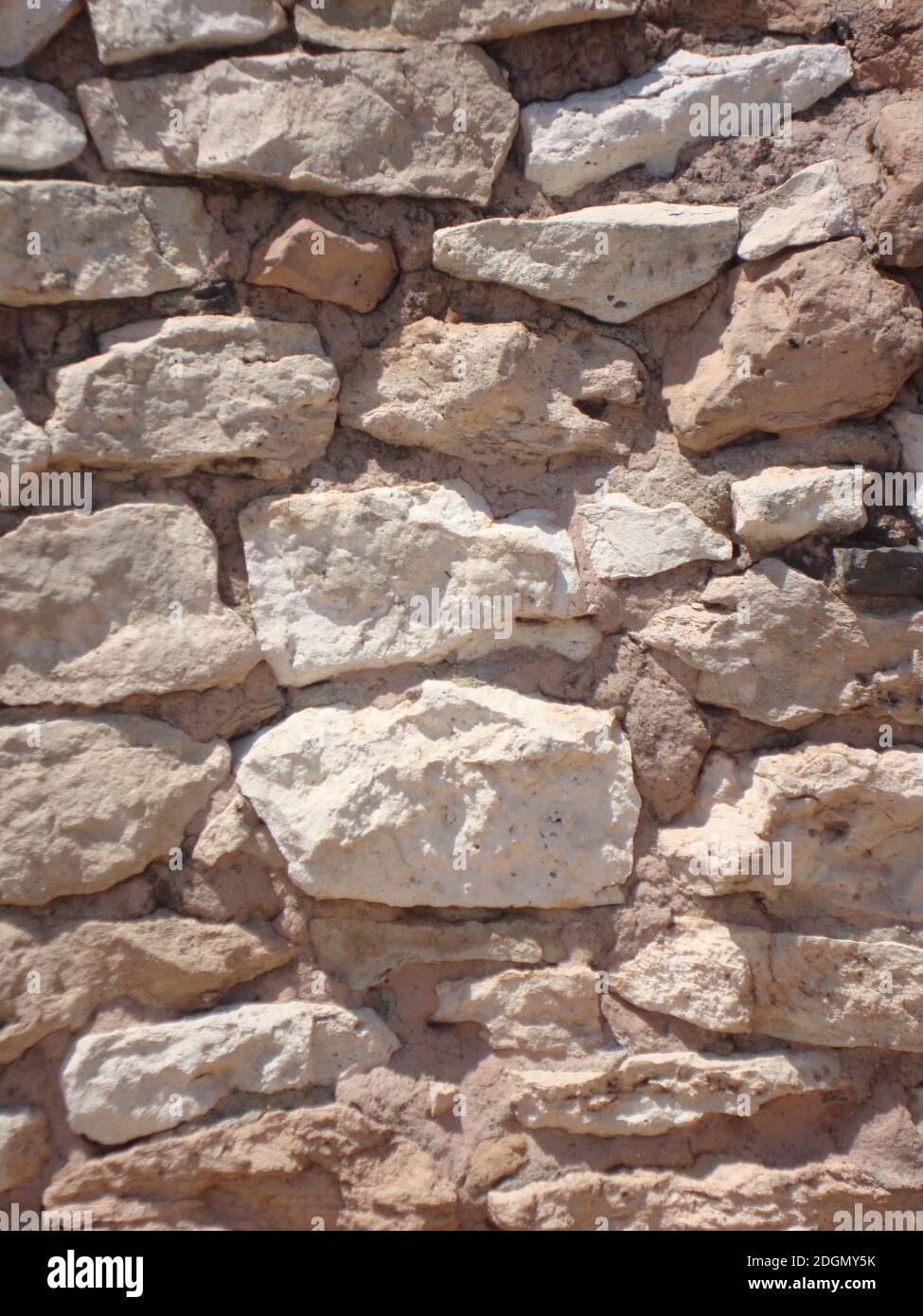 A closeup of stone wall texture from Native American ruins in Tuzigoot ...