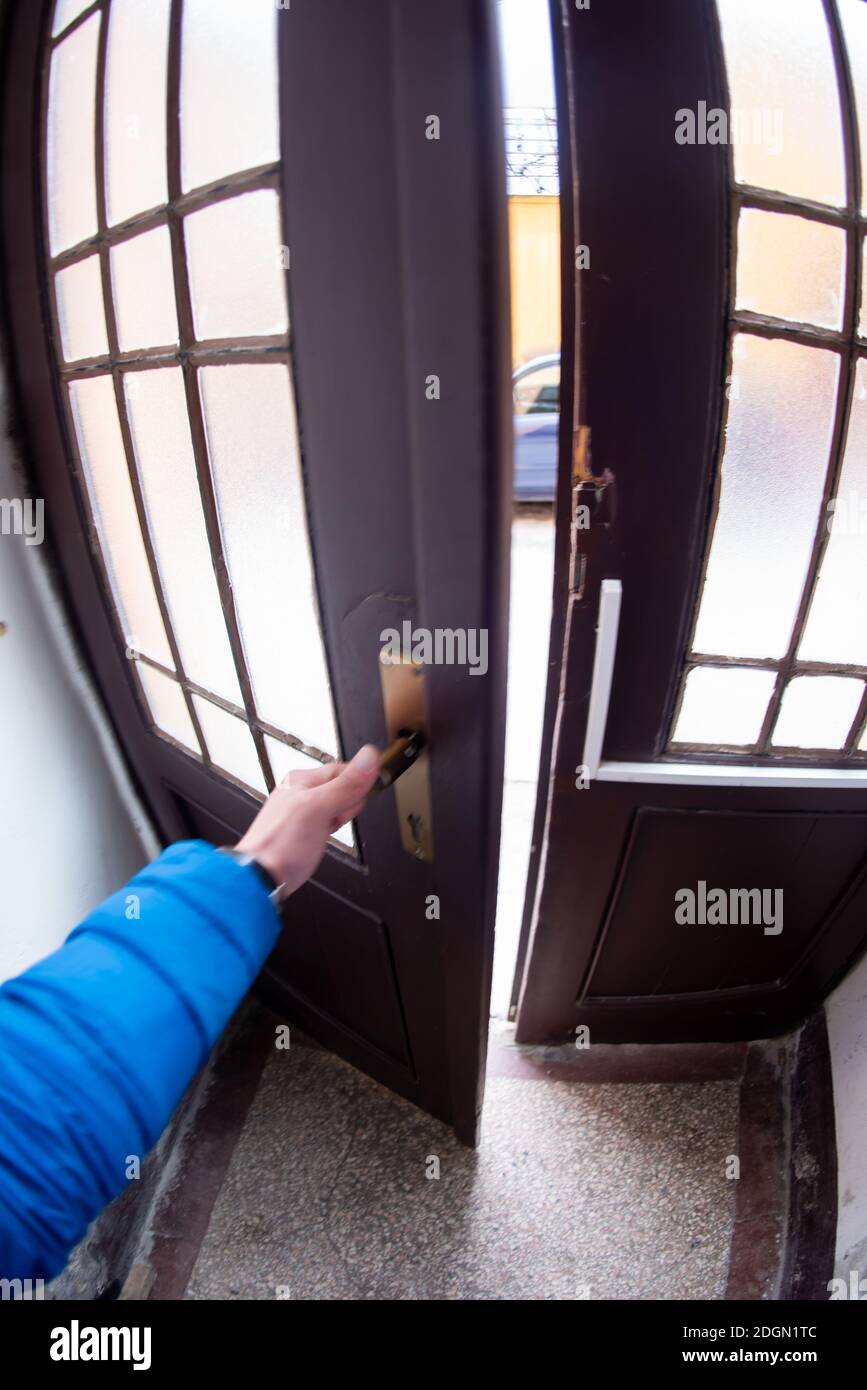 Man opening the door of a building hi-res stock photography and images ...