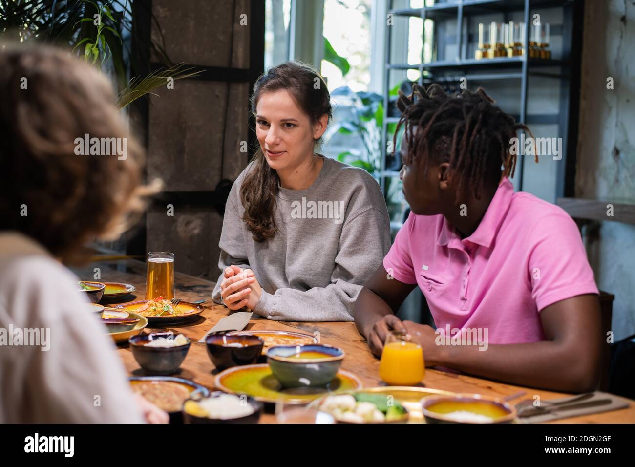 Highschool students having a lunch in a modern cafe Stock Photo - Alamy