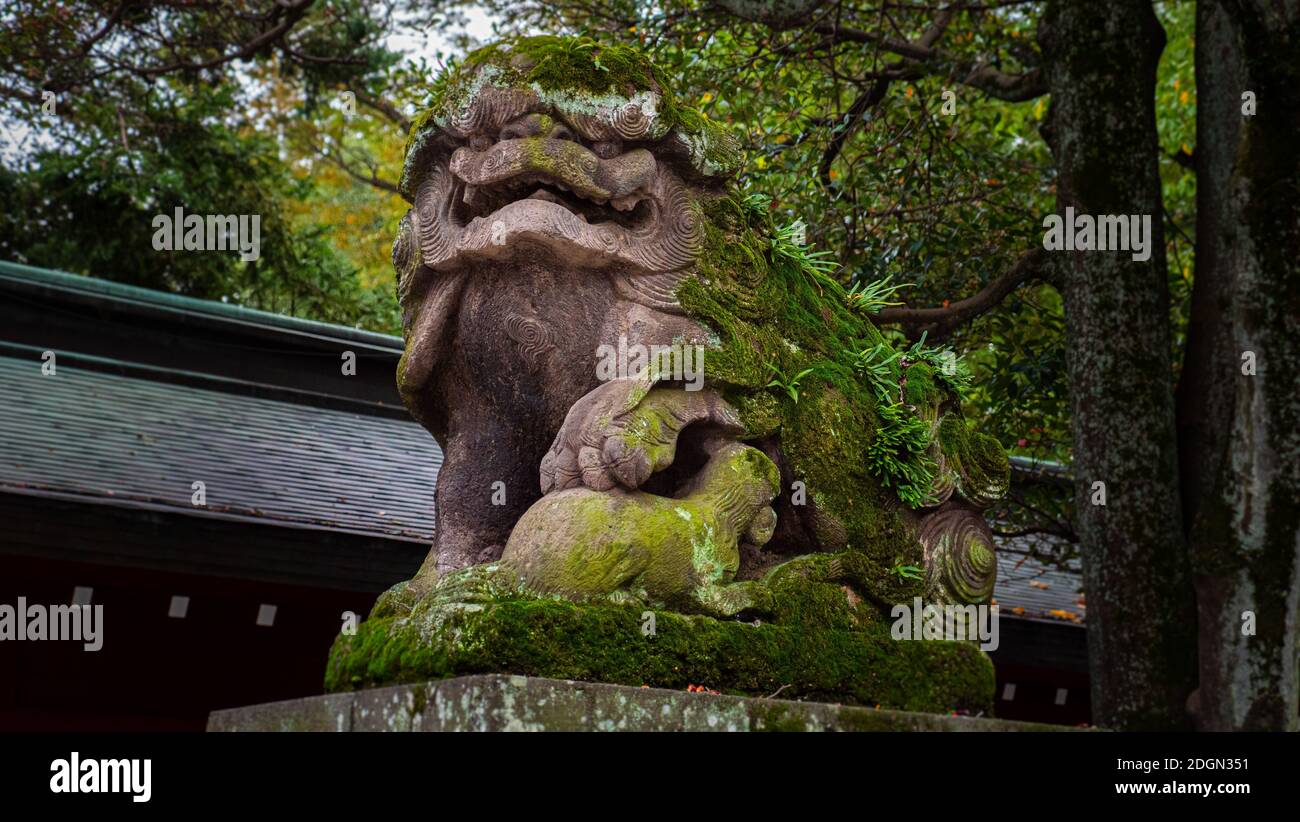 Buddharupa (Form of the Awakened One) statue in Tokyo Japan with green ...