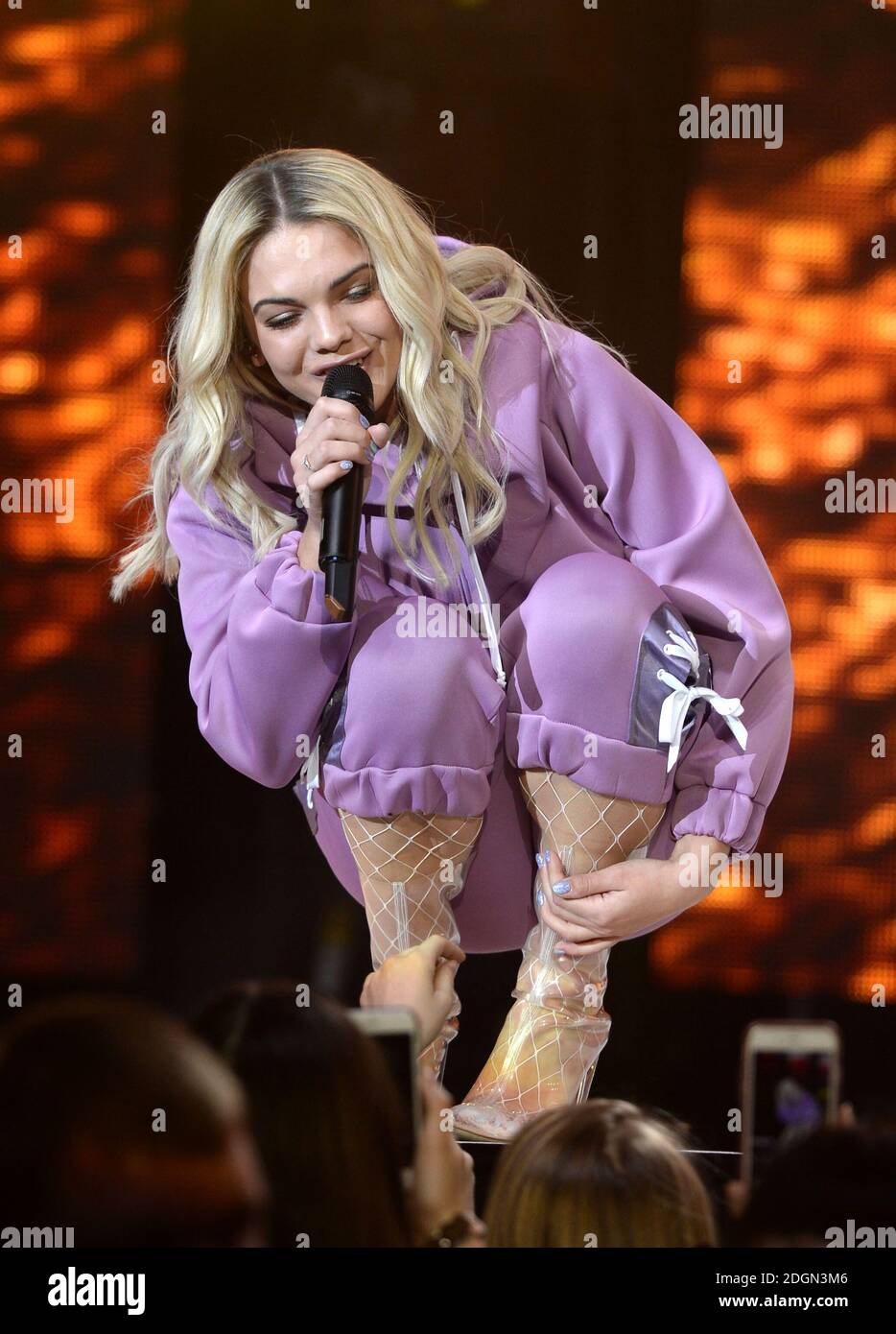 Louisa Johnson on stage at the Capital FM Jingle Bell Ball 2016 with ...