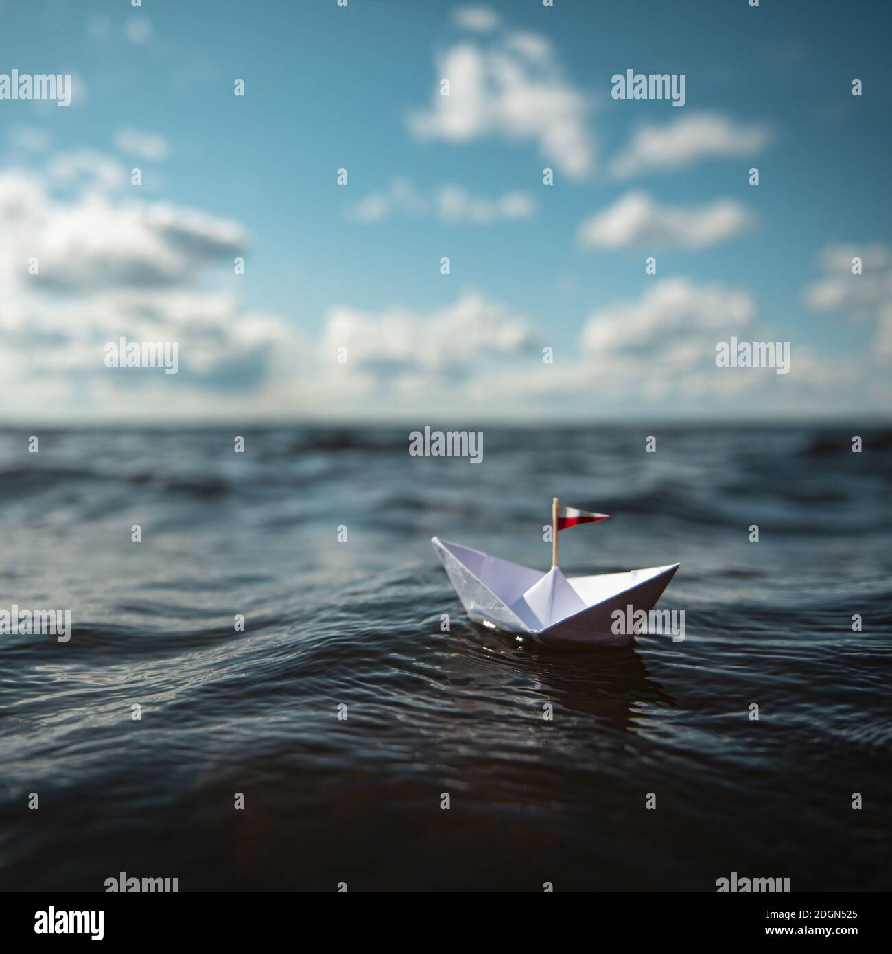 Paper Boat in Big Waves Stock Photo - Alamy