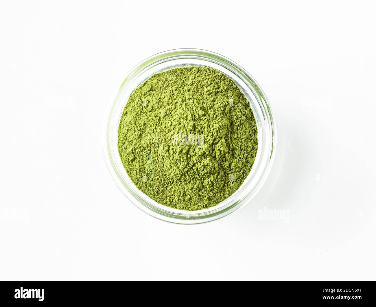 Green matcha tea powder explosion,white background Stock Photo - Alamy