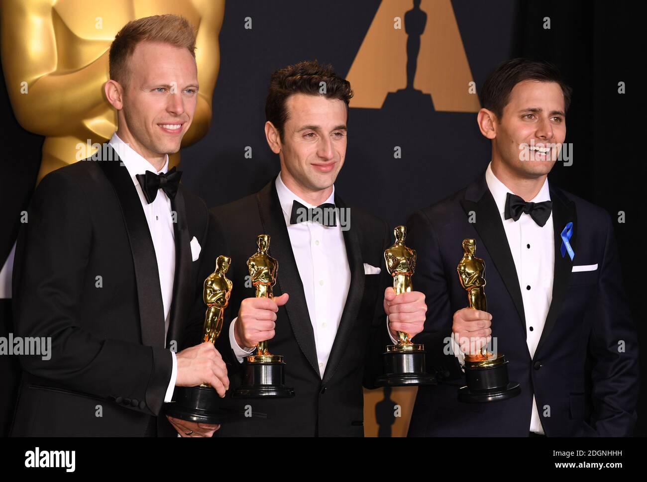 Songwriters Justin Paul, Justin Hurwitz and Benj Pasek, winners of the Best Original Song award ...