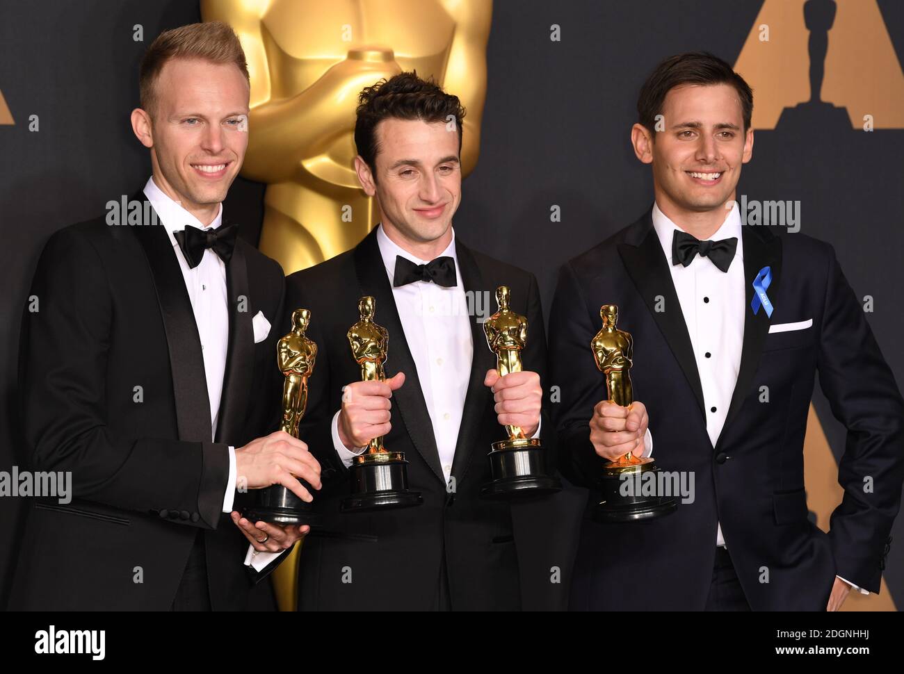 Songwriters Justin Paul, Justin Hurwitz and Benj Pasek, winners of the Best Original Song award ...