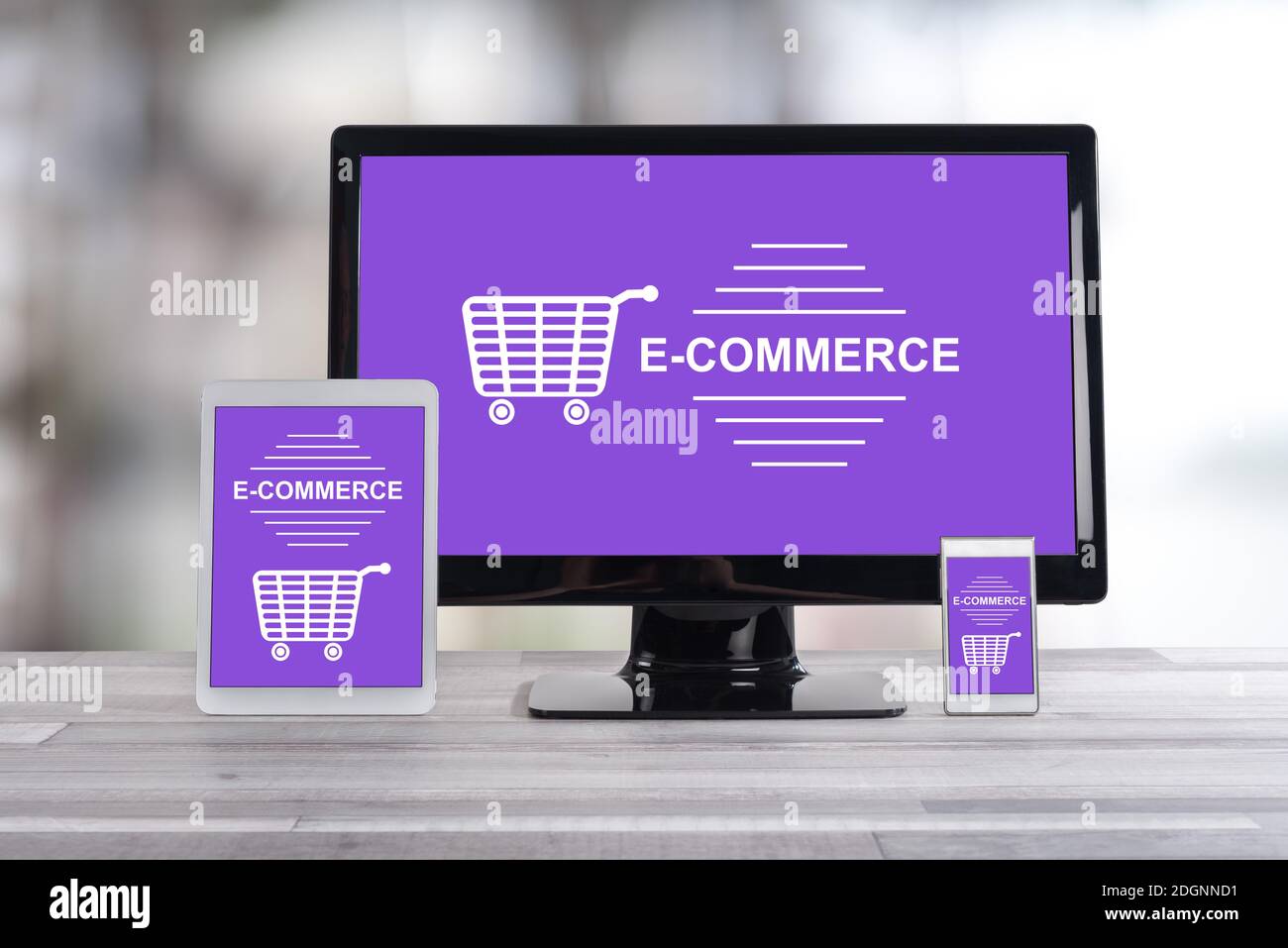 E-commerce concept shown on different information technology devices ...