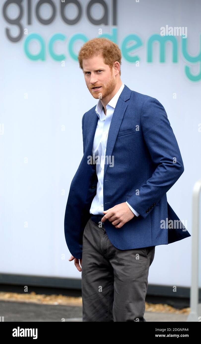 Prince Harry after attending the opening of The Global Academy, Hayes ...