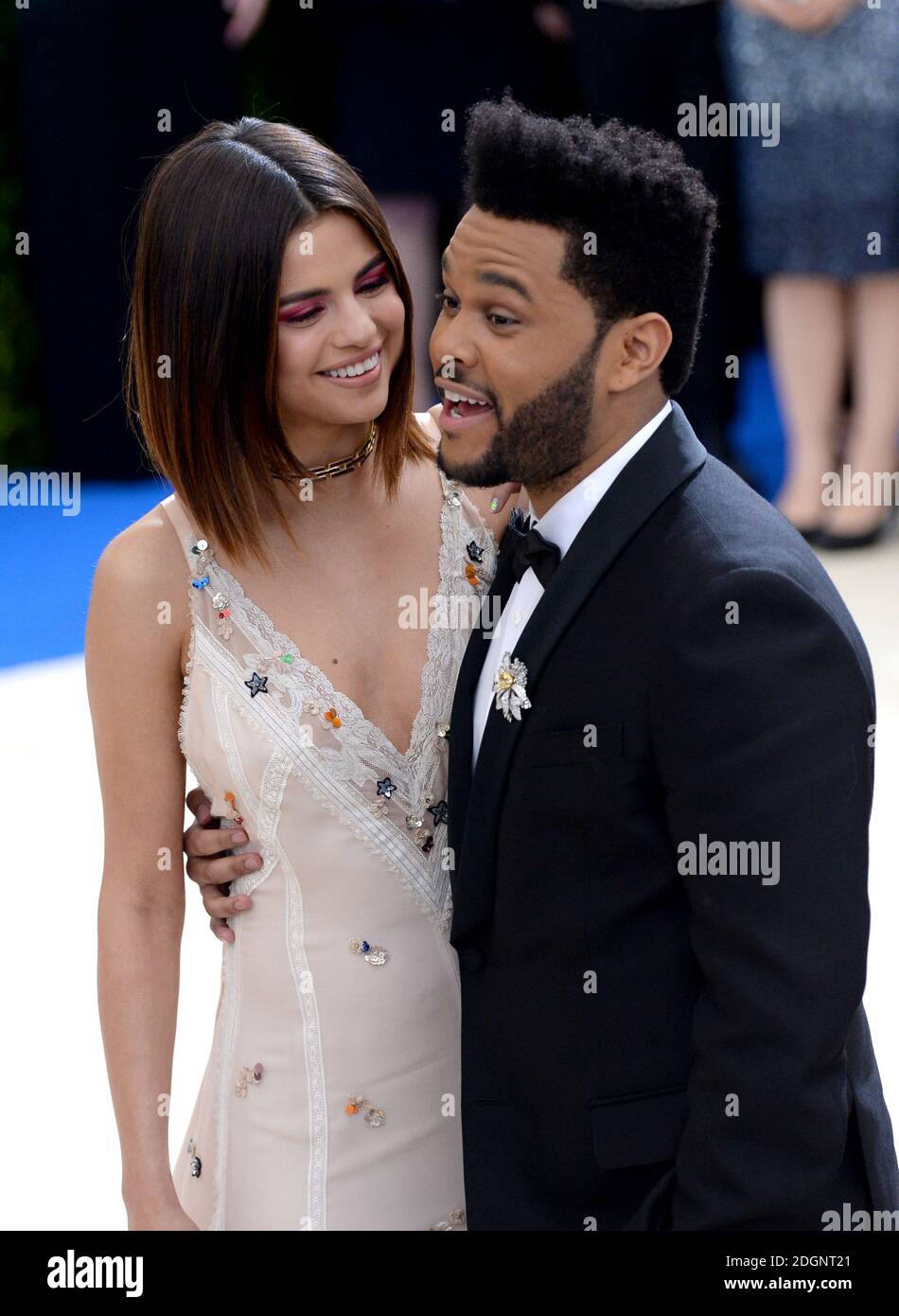 Selena Gomez and The Weeknd attending The Metropolitan Museum of Art ...