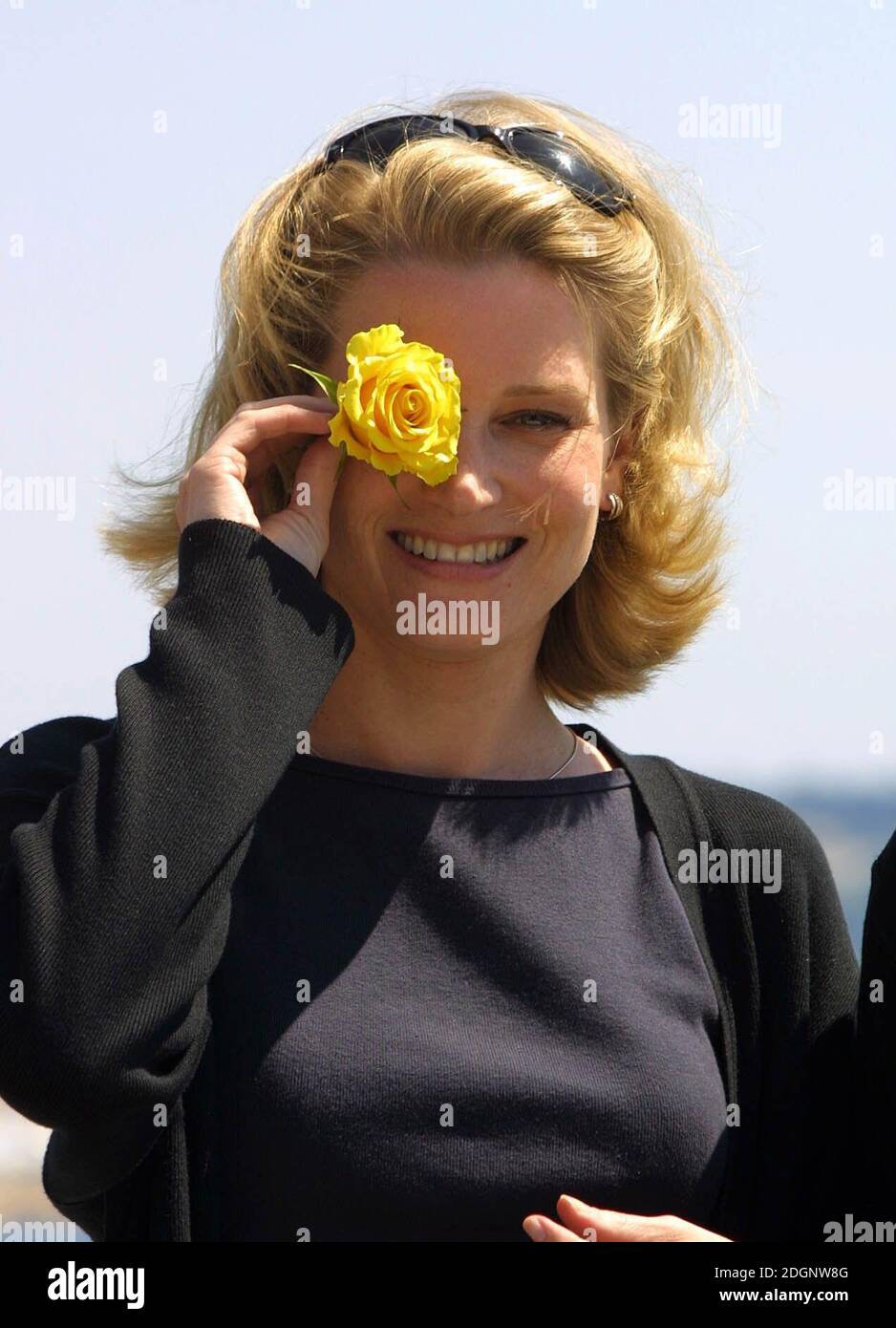 Bridget Fonda at the Cannes Film Festival 2001. Headshot. rose, flower ...