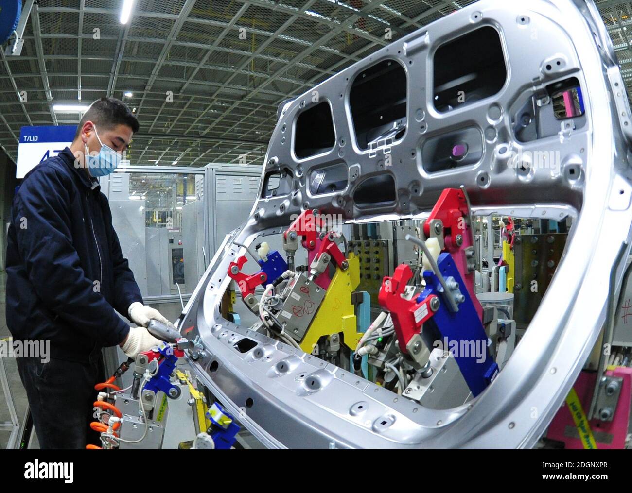 Body works employee hi-res stock photography and images - Alamy