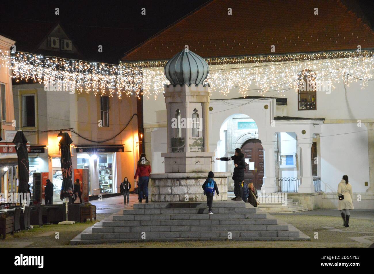 The city Tuzla has and old fountain at night Stock Photo - Alamy