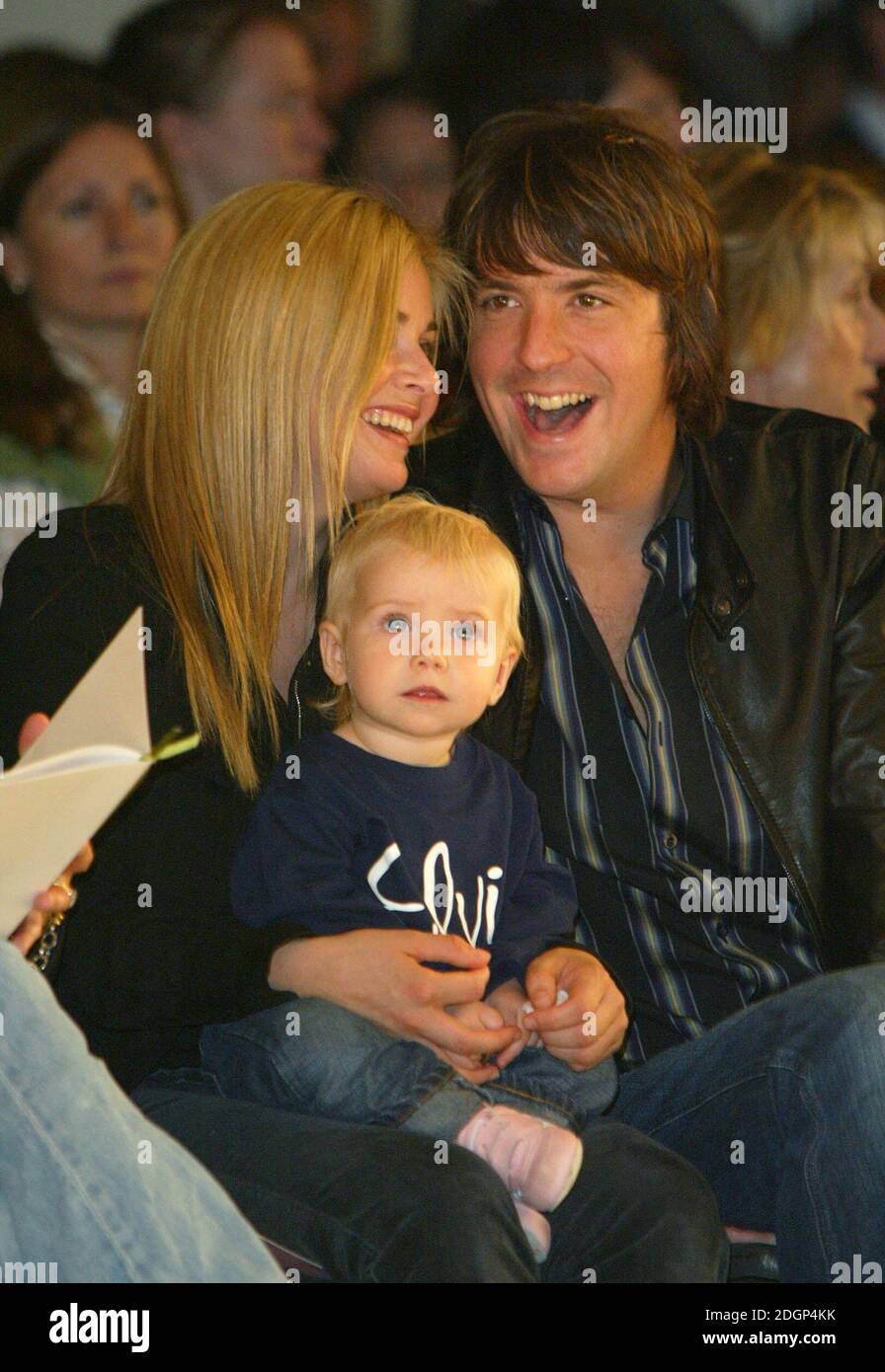 Gail and Dan Hipgrave and their baby daughter Honey sit along side ...