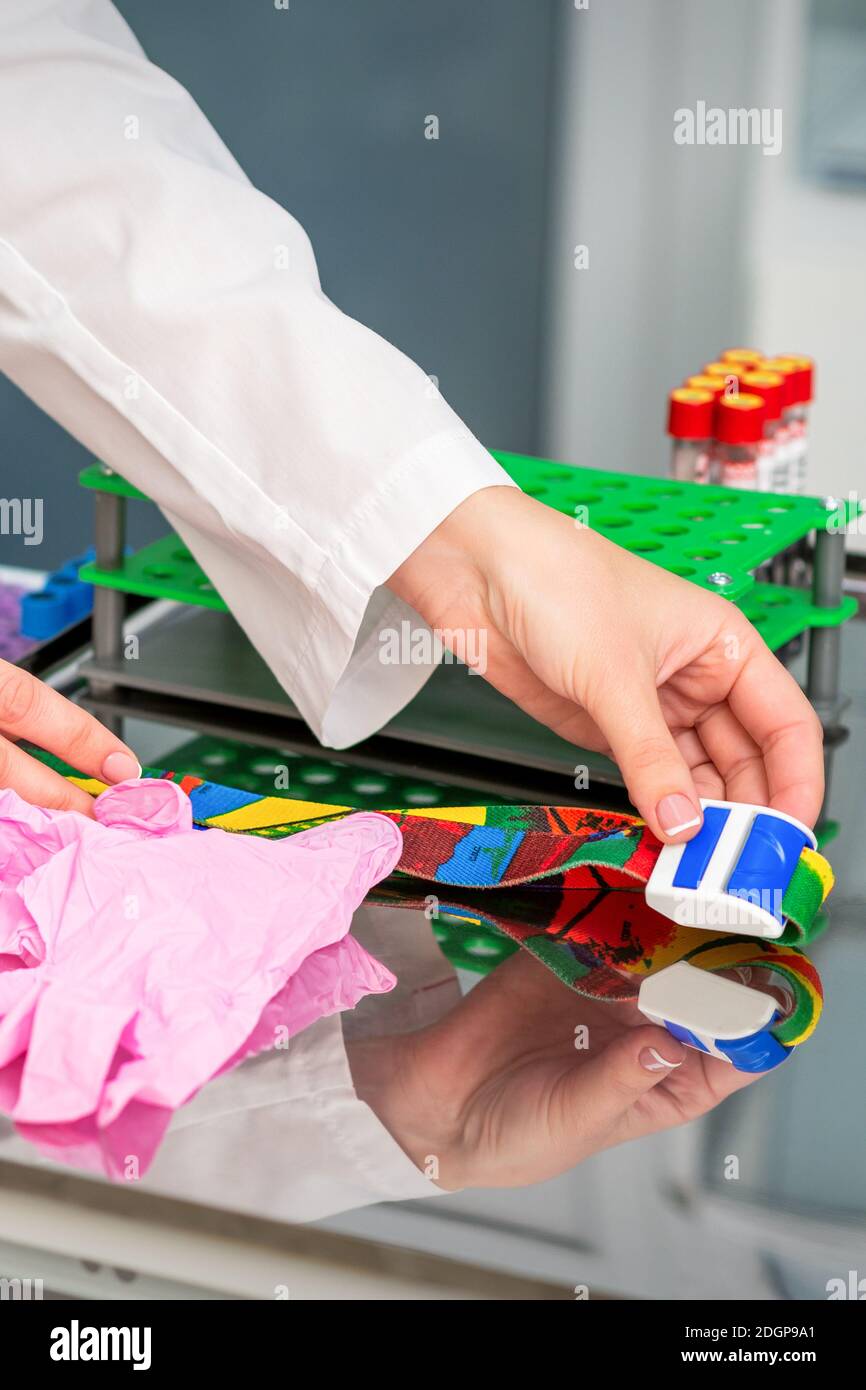 Female doctor's hands prepare tools for blood sampling in the lab Stock ...