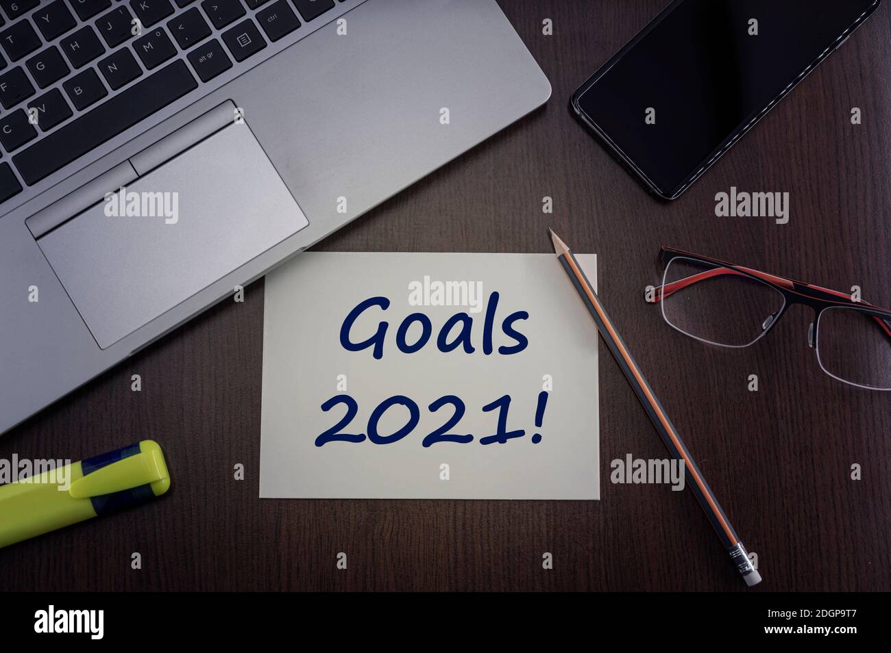 Goals 2021 card. Top view of office table desktop background with ...