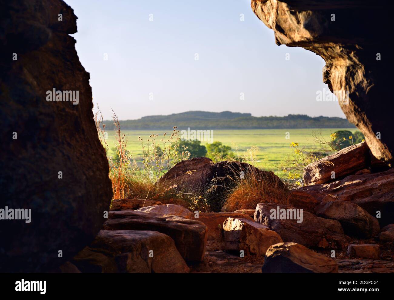 View from rock, looking like window, formation at beautiful sunset in ...