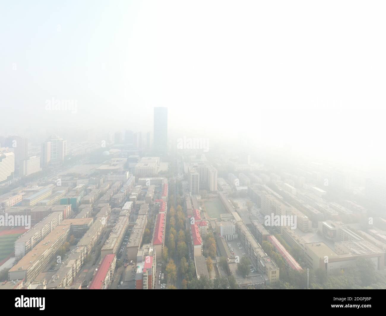 --FILE--An aerial view of buildings at downtown area covered by severe ...