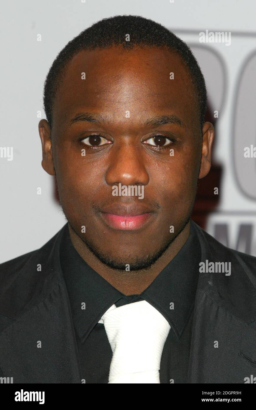 Eastenders star Mohammed George arriving at the 2004 TV Moments, BBC ...