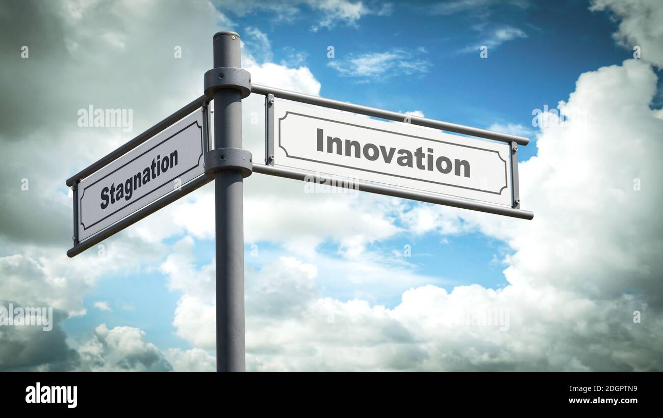 Street Sign Innovation versus Stagnation Stock Photo - Alamy