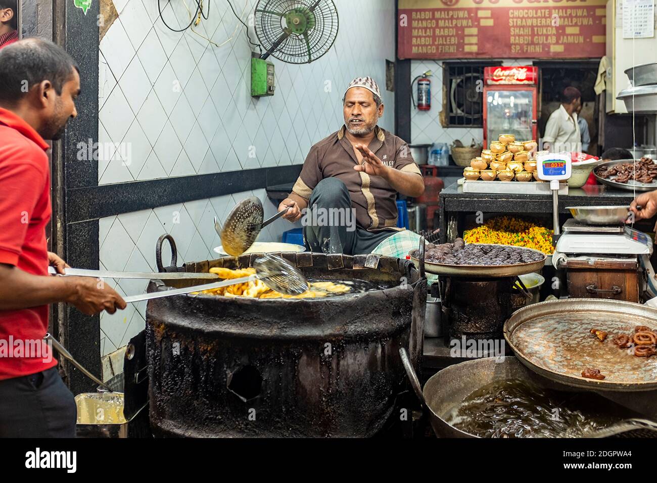 Making jalebi in a kadhai at the famous JJ Jalebi in the Mohammed Ali ... Making jalebi in a kadhai at the famous JJ Jalebi in the Mohammed Ali ...