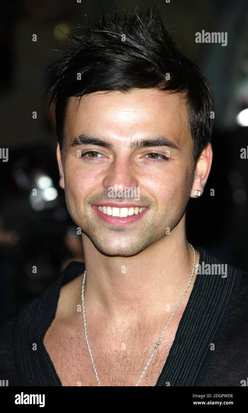Andy Scott Lee arriving at the world premiere of Miss Congeniality 2 ...