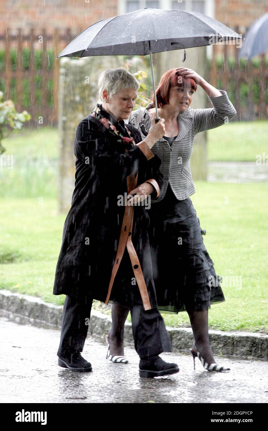Dame Judi Dench attending the funeral of the late actor Sir John Mills ...