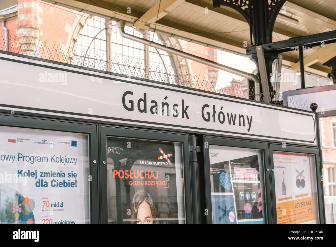 Passengers waiting for a train at the platform of Gdansk Glowny railway ...