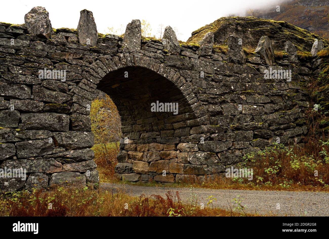 Old road bridge made from stone with an arch Stock Photo - Alamy