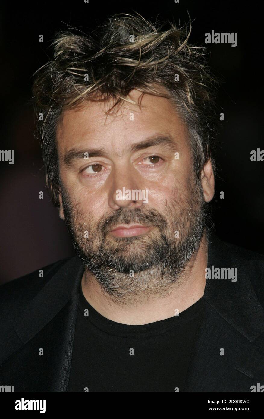 Luc Besson arriving at the premiere of Revolver, Leicester Square ...