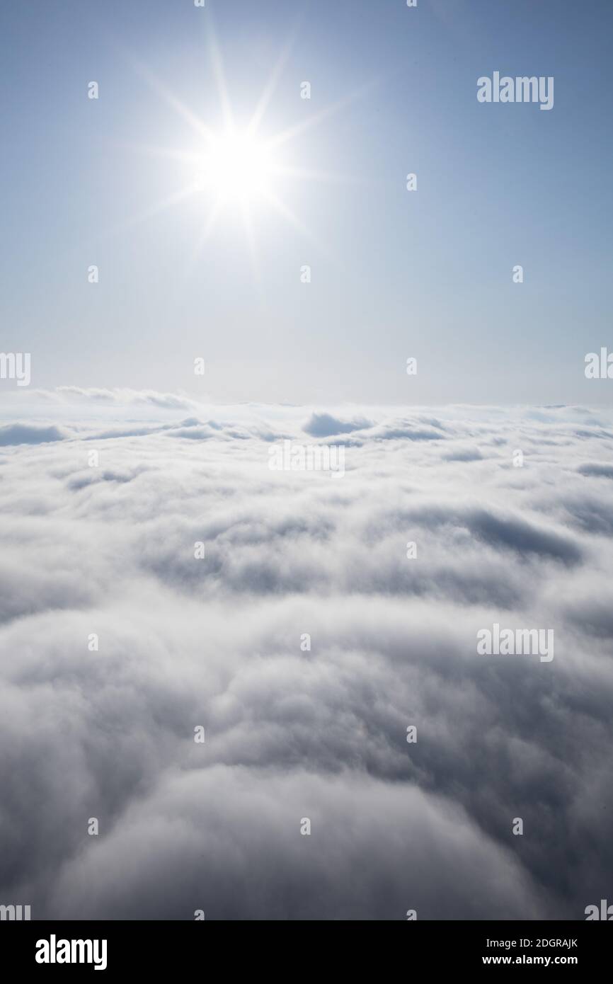 Rising above clouds hi-res stock photography and images - Alamy