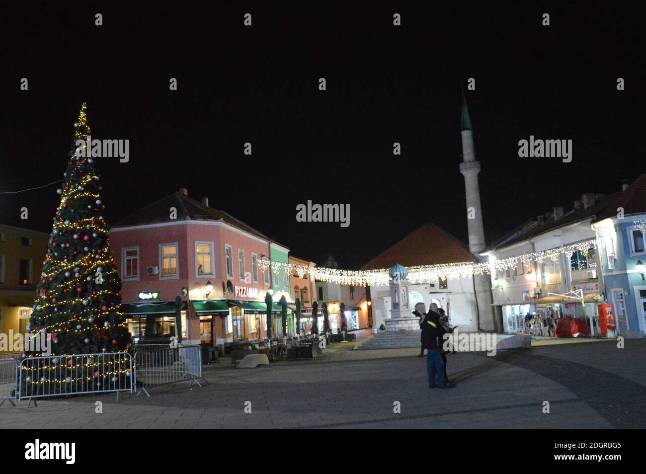 The city of Tuzla an decorative christmas tree and old fountain Stock ...