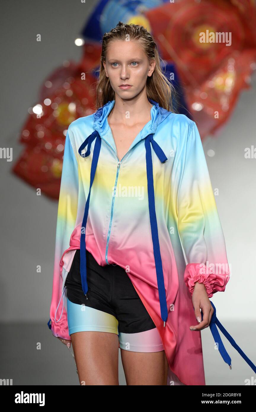 Models on the catwalk during the Fyodor Golan London Fashion Week SS18 ...