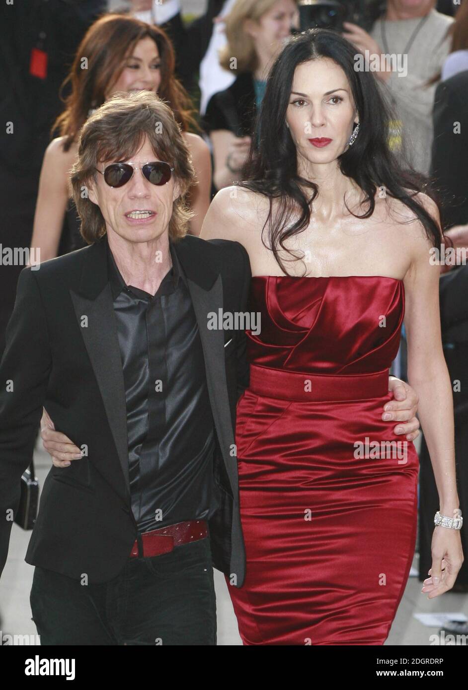 Mick Jagger and L'Wren Scott arriving at the Vanity Fair Oscars Party ...