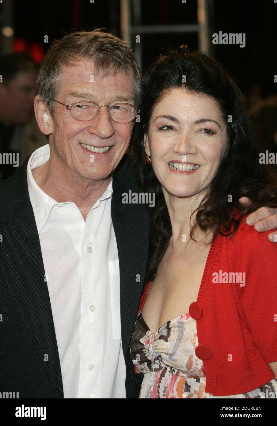 John Hurt and Ann Rees arriving at the UK Premiere of V for Vendetta ...
