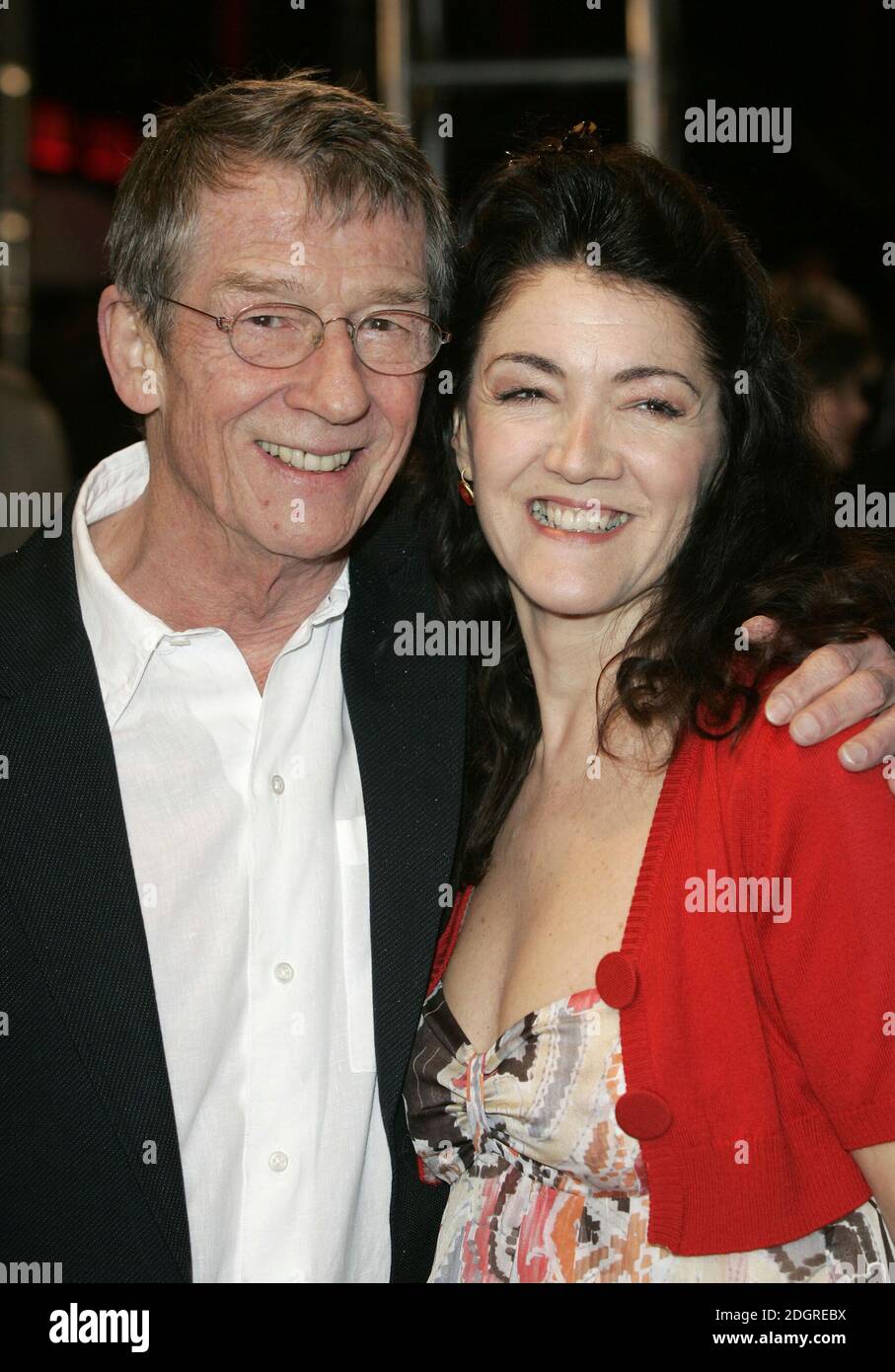 John Hurt and Ann Rees arriving at the UK Premiere of V for Vendetta ...