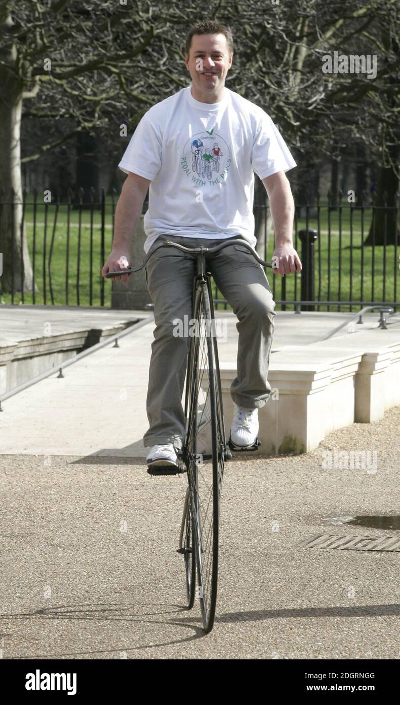 Handy Andy poses Stock Photo - Alamy