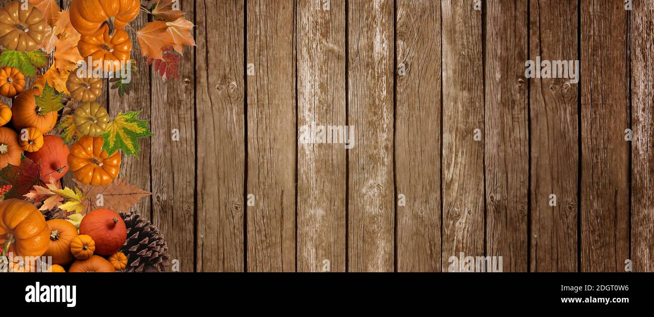 Natural fall frame of pumpkins and leaves. Above view on a rustic dark ...