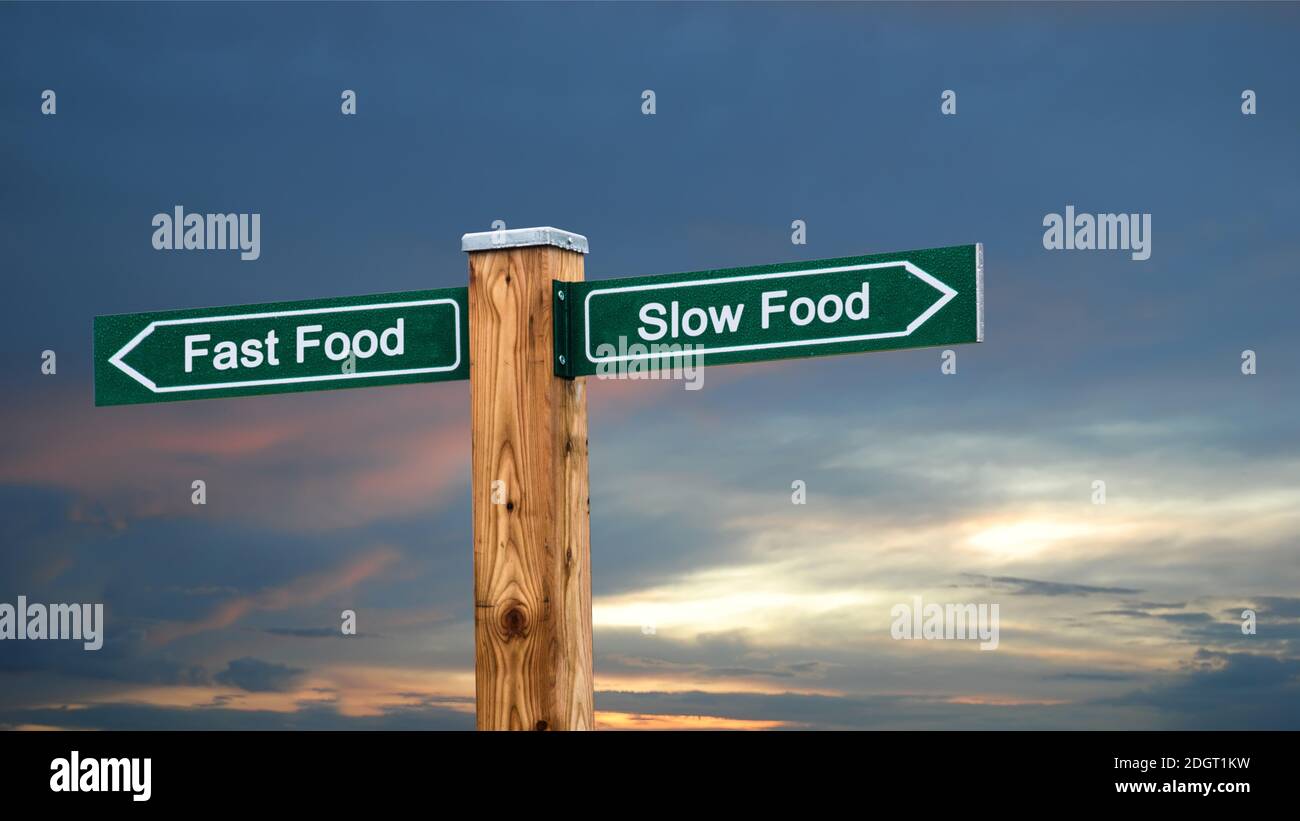 Street Sign Slow versus Fast Food Stock Photo - Alamy